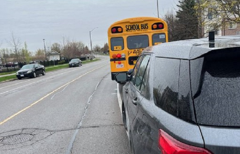 Bus driver with 14 school kids caught ignoring stop sign - Durham Post