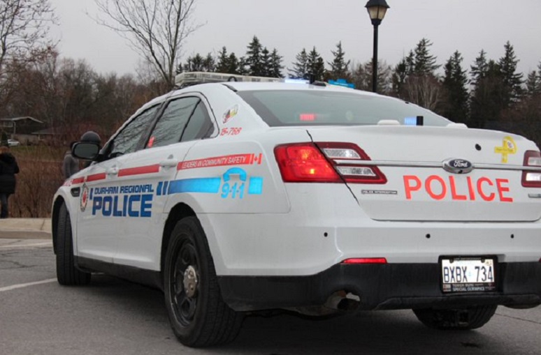 Man barricades self in police cruiser armed with a knife - Durham Post