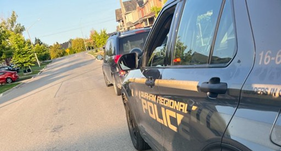 Driver on text while going merrily by a stop sign - Durham Post
